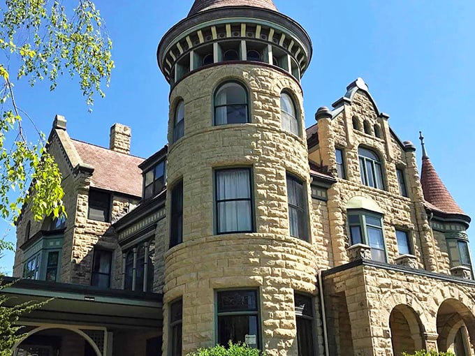 Straight out of a fairy tale, this sandstone fortress with its commanding turret proves Wisconsin can do medieval grandeur without the inconvenience of actual knights storming the gates.