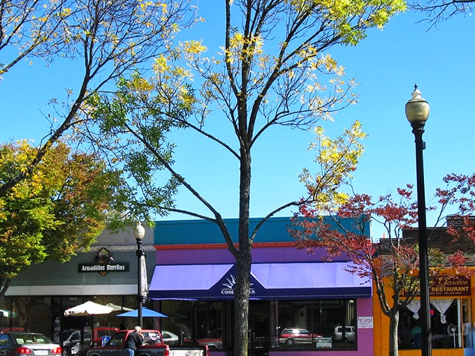 Downtown Keene's colorful storefronts welcome visitors with New England charm. Those awnings aren't just pretty—they're perfect for window shopping in any weather.