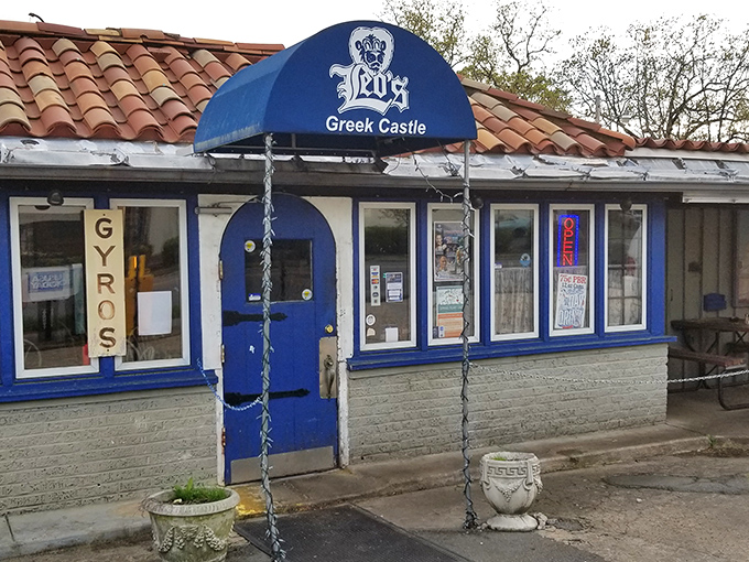 The blue-trimmed façade of Leo's Greek Castle stands like a Mediterranean mirage in Little Rock's Hillcrest neighborhood, promising authentic flavors behind its humble doors.