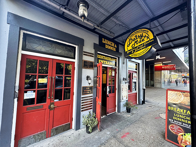 Those bright red doors aren't just an entrance—they're a portal to Southern breakfast nirvana in the heart of New Orleans.