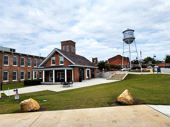 The architectural equivalent of a perfect first date: charming brick exterior, wooden shingle roof, and the promise of books and caffeine inside.