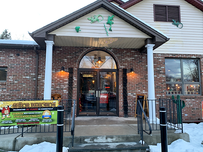 The charming brick-and-siding exterior of Señor Pancho's sports a playful lizard mural, as if saying "come inside for some serious flavor fiesta!"