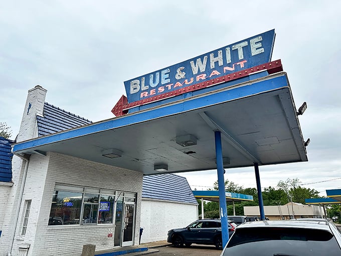 The iconic blue roof and vintage sign beckon like an old friend. This isn't just a restaurant—it's a Mississippi landmark that's been serving comfort for generations. 