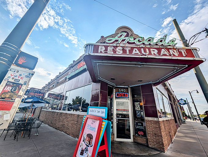 That iconic red exterior isn't just a building—it's a time machine disguised as Memphis's oldest café. The neon practically winks at you.
