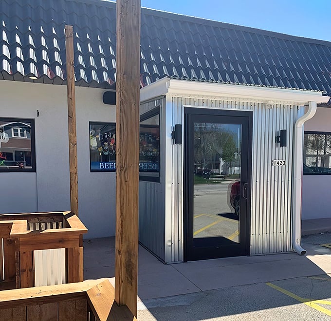 The unassuming white exterior with cheerful blue chairs hints at the culinary treasures within. Like finding a diamond in Wisconsin's cheese country.
