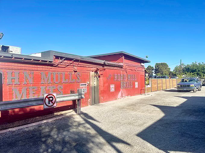 Welcome to barbecue heaven! This rustic red exterior isn't just a building, it's a portal to smoky, meaty bliss.