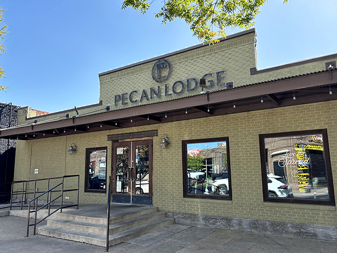 The unassuming exterior of Pecan Lodge belies the smoky treasures within. Like all great Texas institutions, it lets the food do the talking.