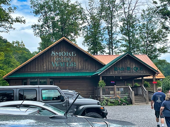 The rustic cabin exterior promises mountain magic before you even step inside. Mother Nature herself couldn't have designed a more perfect barbecue setting.