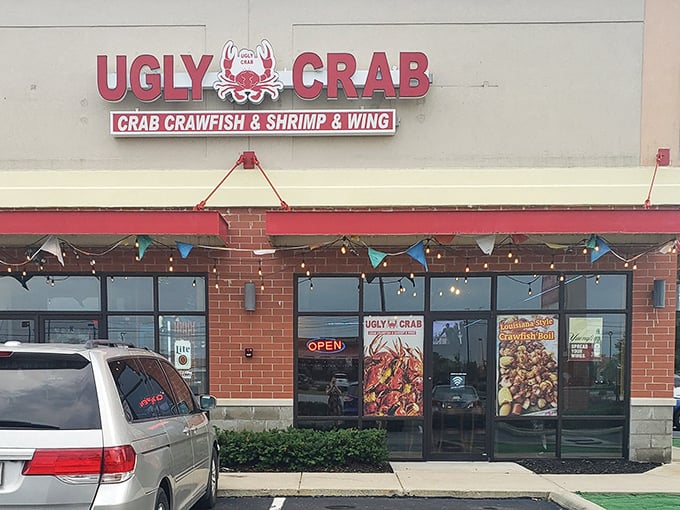 The unassuming storefront of Ugly Crab boldly announces its seafood mission – where flavor trumps vanity and Hoosiers find coastal treasures.