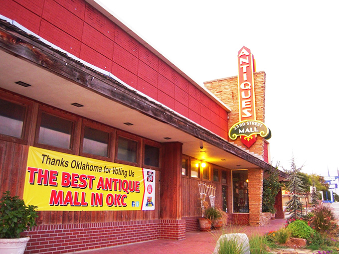 The iconic vintage sign beckons like a time-travel invitation, promising treasures inside this brick building on Oklahoma City's 23rd Street.