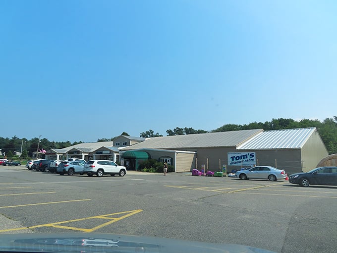The unassuming exterior of Tom's Discount Store – where retail magic happens without the fancy wrapping. Bargain paradise awaits!