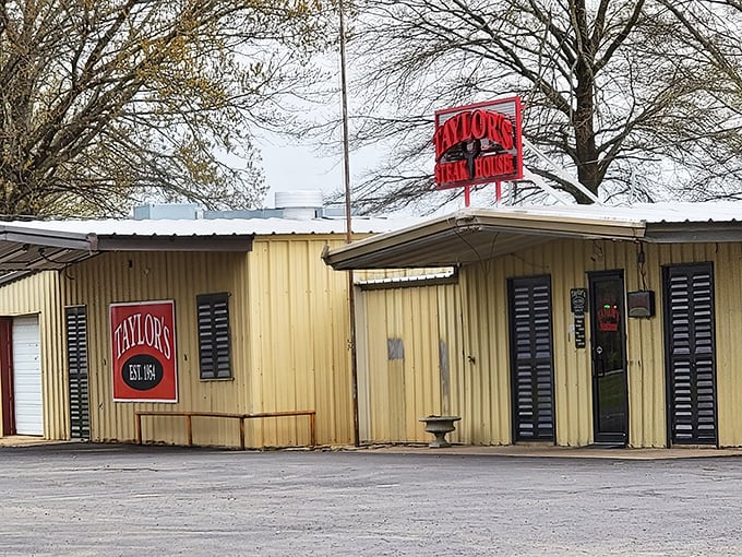 The unassuming exterior of Taylor's Steakhouse proves once again that culinary greatness often hides behind the most modest facades.