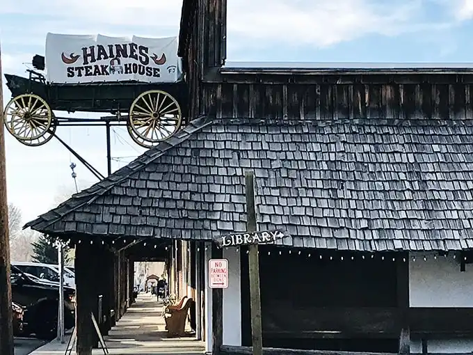 The iconic covered wagon sign perched atop Haines Steak House isn't just decoration—it's a beacon calling hungry travelers from across Eastern Oregon's vast landscape.
