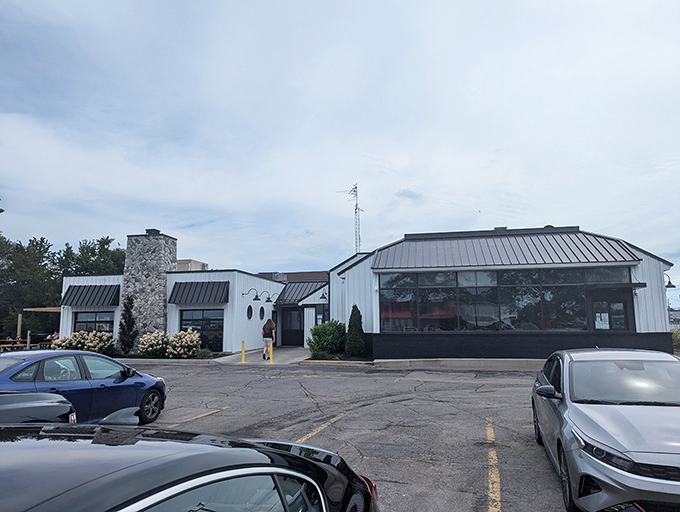 The iconic blue awning of Jolly Roger Seafood House stands as a beacon for seafood pilgrims. Like a coastal mirage in Port Clinton, it promises treasures from the deep.