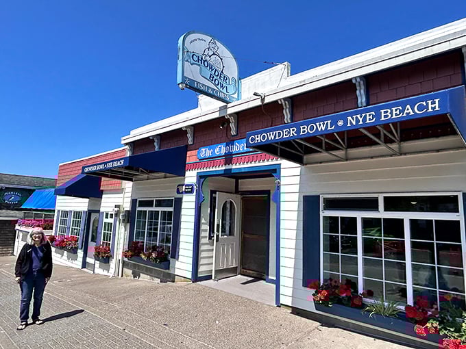 The classic coastal charm of The Chowder Bowl beckons like an old friend, its blue-trimmed facade promising seafood salvation after a long drive.
