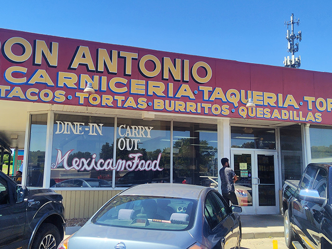 The yellow and red sign doesn't whisper, it announces: "Authentic Mexican food happens here!" No fancy marketing needed when the tacos speak for themselves.