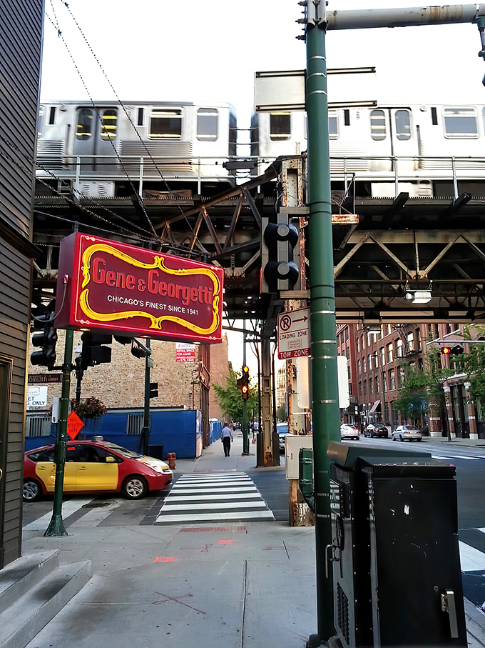 The iconic red and gold sign beckons like a lighthouse for steak lovers. Chicago's culinary history hangs right there on Franklin Street. Photo Credit: Andy P