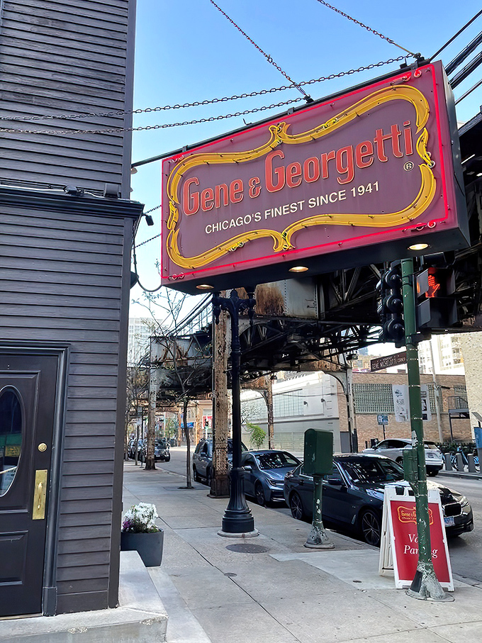 The iconic red and gold sign beckons like a lighthouse for steak lovers. Chicago's culinary history hangs right there on Franklin Street. Photo Credit: Andy P