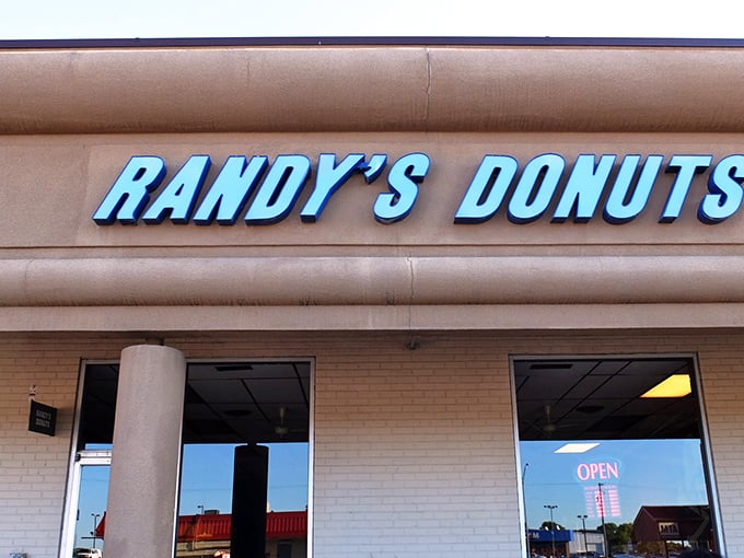 The iconic giant donut sign at Randy's isn't just a landmark—it's a beacon of hope for those suffering from acute pastry deficiency. 