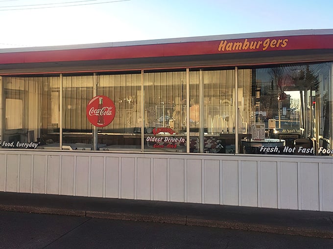 The iconic white building with red trim has been a Hutchinson landmark since 1948. The "Hamburgers" sign promises nostalgic delights within.