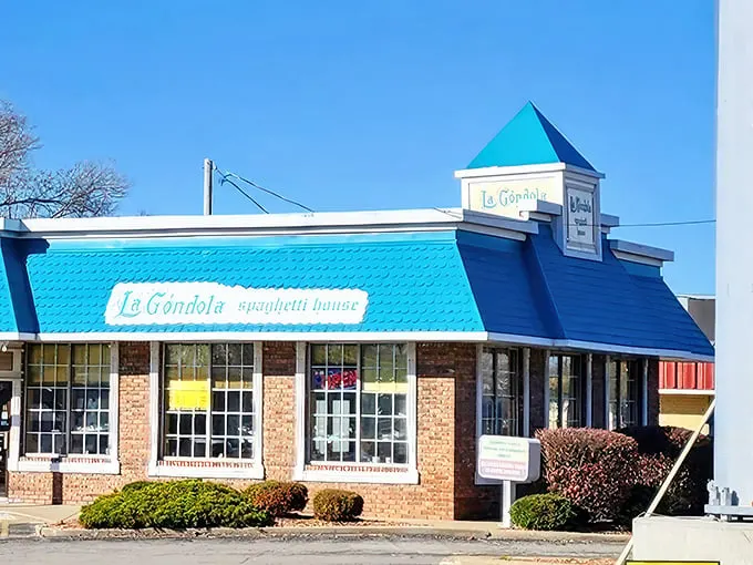 The iconic turquoise roof of La Gondola stands out like a pasta-lover's lighthouse, beckoning hungry travelers with promises of spaghetti salvation in Decatur.
