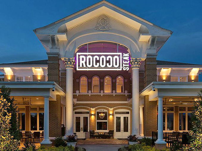 Grand doesn't begin to describe it. Rococo Steak's majestic exterior, with its illuminated columns and elegant façade, promises a dining experience worthy of royalty.