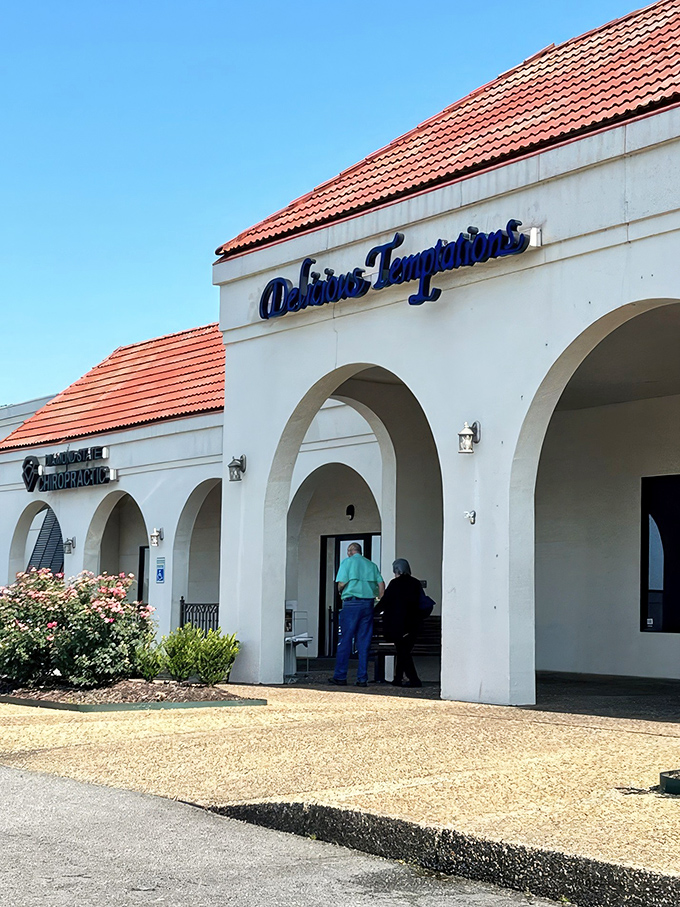 The white stucco exterior with Spanish-style arches might not scream "breakfast paradise," but locals know this unassuming building houses morning magic.