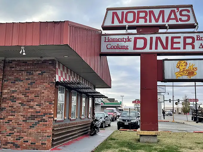 The iconic red exterior of Norma's Diner stands as a beacon of breakfast hope along Joplin's streets, promising homestyle cooking that's worth every mile of the journey.