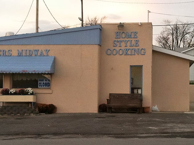 The unassuming exterior of Midway Restaurant stands as a beacon of breakfast hope in Kenton, where culinary magic happens behind that modest façade.