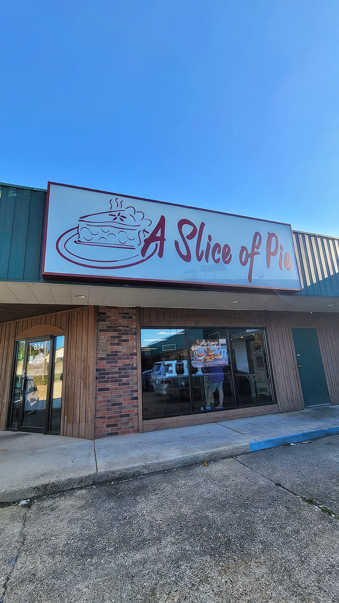 The unassuming storefront of A Slice of Pie belies the culinary magic happening inside. Like finding treasure in a strip mall. 