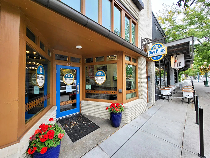 The blue door beckons like a portal to Bavaria, right in downtown Coeur d'Alene. Those red geraniums aren't just for show—they're practically shouting "Willkommen!"