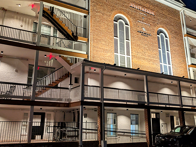 The historic brick façade of Wye Oak Tavern stands proudly in Frederick, its tall windows like eyes that have witnessed centuries of Maryland history.