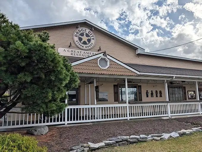The Western frontier meets Pennsylvania charm at Dodge City's inviting exterior. That wide front porch practically whispers, "Come on in, partner, your steak awaits."