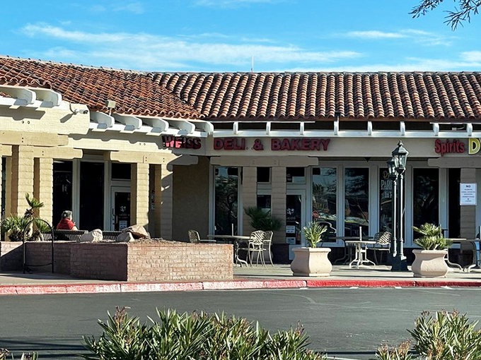 The pink-hued exterior of Weiss Deli beckons like a mirage in the Nevada desert—a promise of East Coast comfort in the most unexpected place.