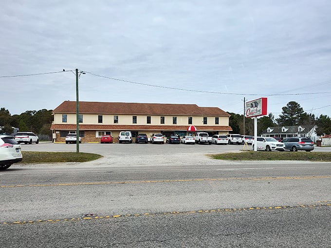 The unassuming exterior of Casey's Buffet proves the age-old wisdom: never judge a Southern feast by its façade. This Wilmington institution promises comfort within those walls.