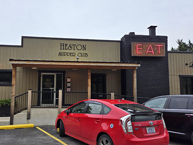 The unassuming tan exterior of Heston Supper Club stands like a culinary speakeasy, promising treasures for those who know to look beyond first impressions.