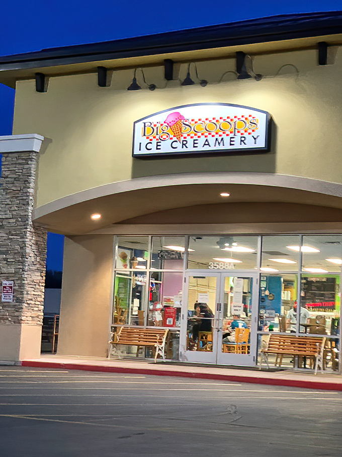 The cheerful yellow exterior of Big Scoops beckons like a dessert lighthouse, complete with welcoming benches where you can savor your frozen treasures in the Utah sunshine. 