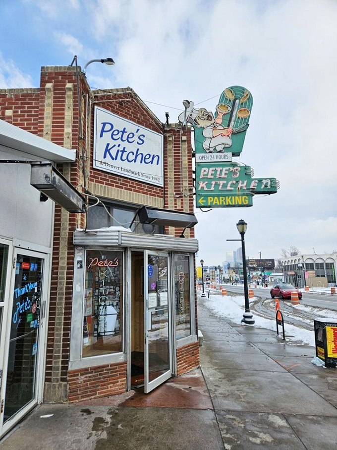 The neon glow of Pete's Kitchen at dusk isn't just a sign—it's a beacon of hope for hungry souls wandering Colfax Avenue.