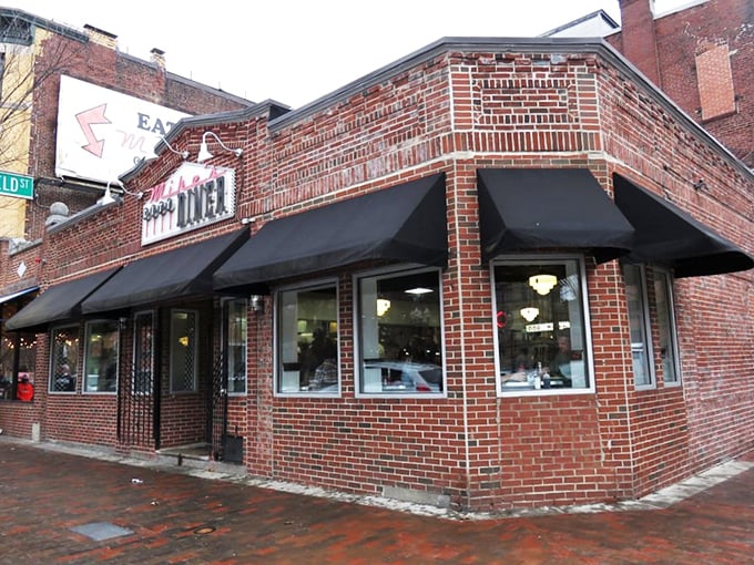 The brick façade of Mike's City Diner stands like a beacon of breakfast hope on Washington Street, promising culinary salvation to hungry Bostonians.