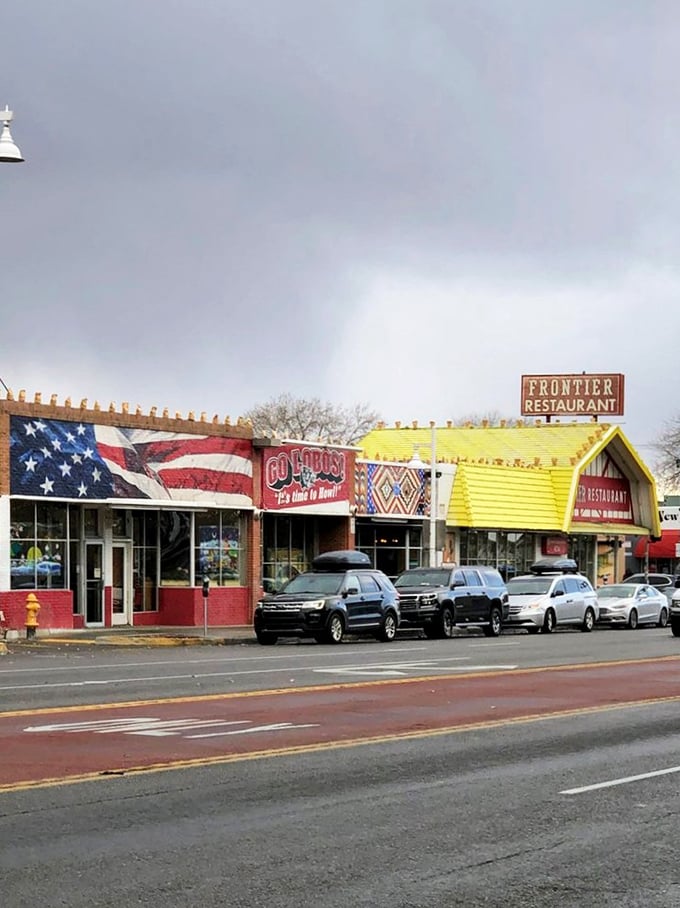 The iconic red-and-white facade of Frontier Restaurant stands as Albuquerque's culinary lighthouse, beckoning hungry souls from Central Avenue.