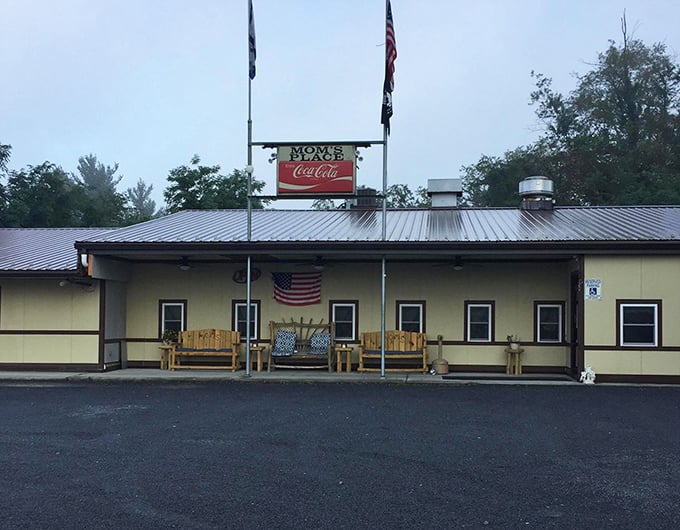 Mom's Place doesn't need fancy architecture to announce its greatness – that gravel parking lot filled with local trucks tells you everything you need to know.