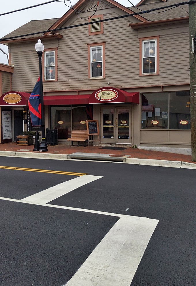 The red awning beckons like a lighthouse for hungry travelers. Jimmy's promise to treat "Everyone Like A Regular" isn't just a slogan—it's their delicious reality.