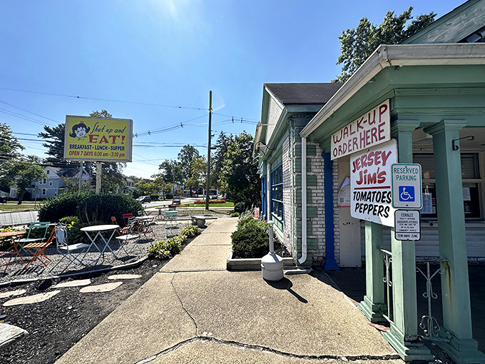 The mint-green and blue exterior of Shut Up and Eat beckons like a colorful oasis of comfort food in Toms River. 