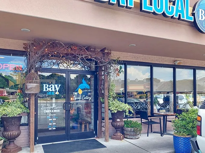 The unassuming exterior hides culinary treasures within. Like finding a pearl in an oyster, Bay Local Eatery's strip mall location belies the seafood magic happening inside.