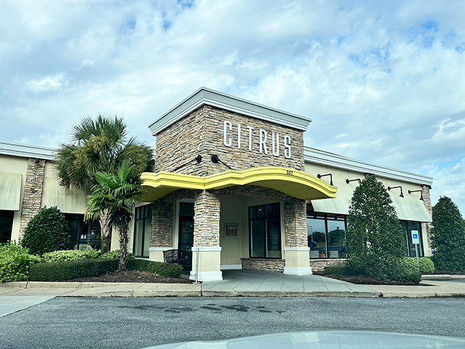 Citrus welcomes hungry visitors with its distinctive stone facade and cheerful yellow awning—like sunshine beckoning you to breakfast paradise.