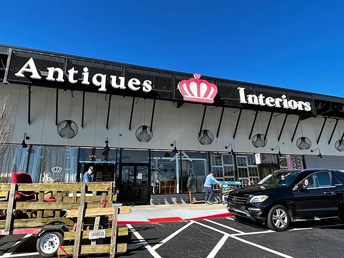 The royal welcome! Queen of Hearts Antiques & Interiors stands proudly in Marietta, its crown logo promising treasure hunters a kingdom of vintage delights inside.