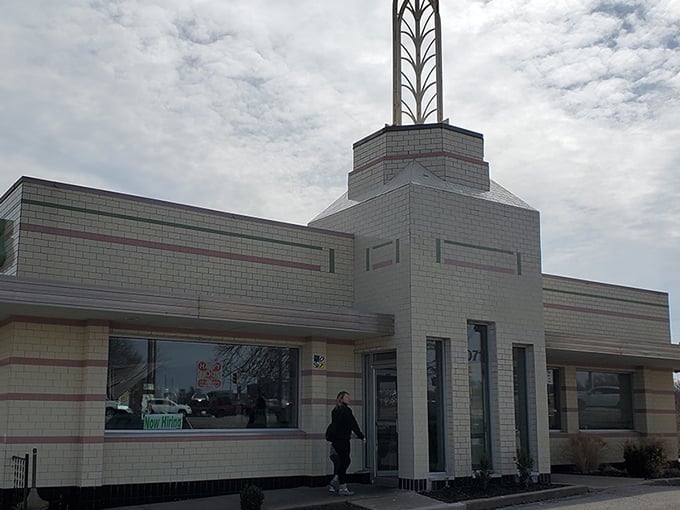 The iconic Art Deco exterior of Winstead's stands like a time capsule of Americana, complete with that distinctive tower that says "good food happens here."