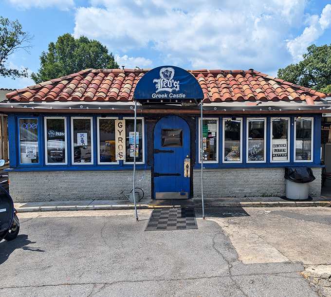 The blue-trimmed façade of Leo's Greek Castle stands like a Mediterranean mirage in Little Rock's Hillcrest neighborhood, promising authentic flavors behind its humble doors.