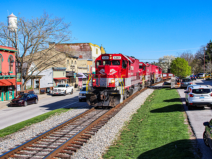 The quintessential small-town moment: a bright red locomotive rumbling past historic storefronts. Midway's railroad heritage isn't just preserved—it's still very much alive!