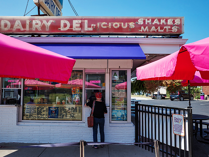 The iconic Dairy Del sign has been beckoning Louisville ice cream lovers since 1951. Those vibrant umbrellas and blue awnings are like beacons of joy on a hot Kentucky day.